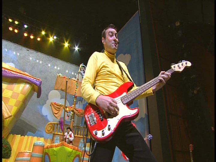 Image - GregPlayingRedFenderBassGuitar.jpg - WikiWiggles